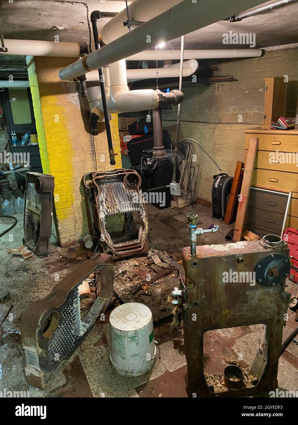 In the process of removing an old boiler that produces steam heat in ...