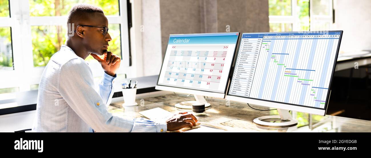 Gantt Chart Calendar Schedule On Multiple Computers Stock Photo - Alamy