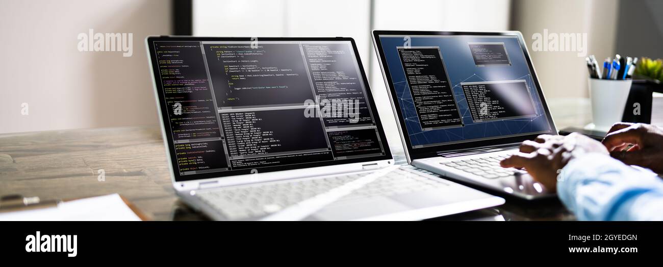 African American Coder Using Computer At Desk. Web Developer Stock ...