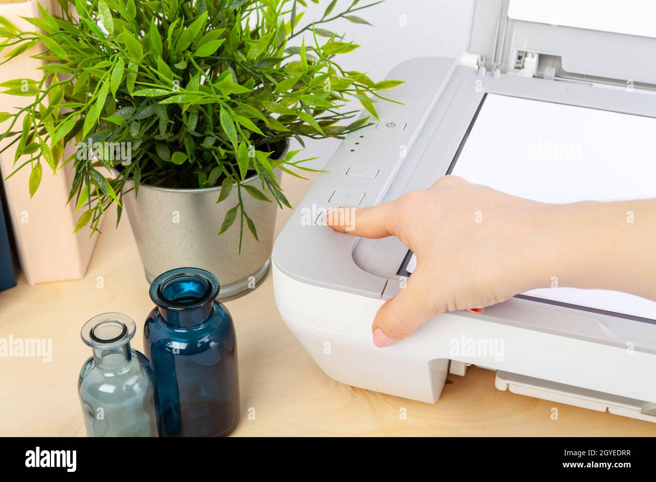 Close up woman using photocopier hi-res stock photography and images ...