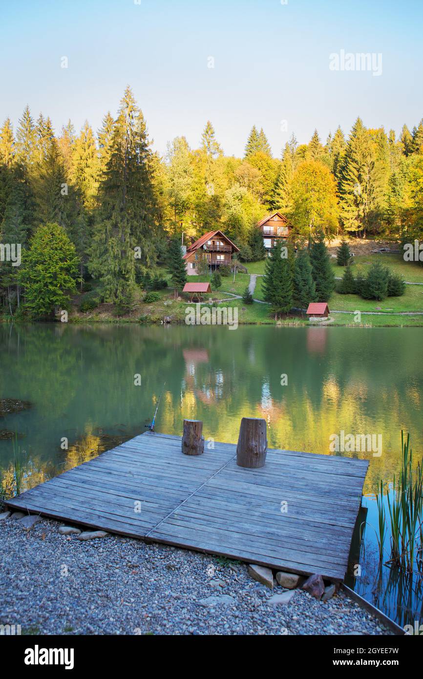 Woman fishing at a forest lake hi-res stock photography and images - Alamy