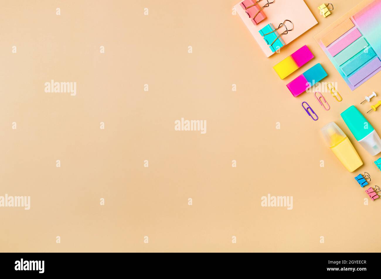 Neutral pastel beige background and school supplies, stationery ...