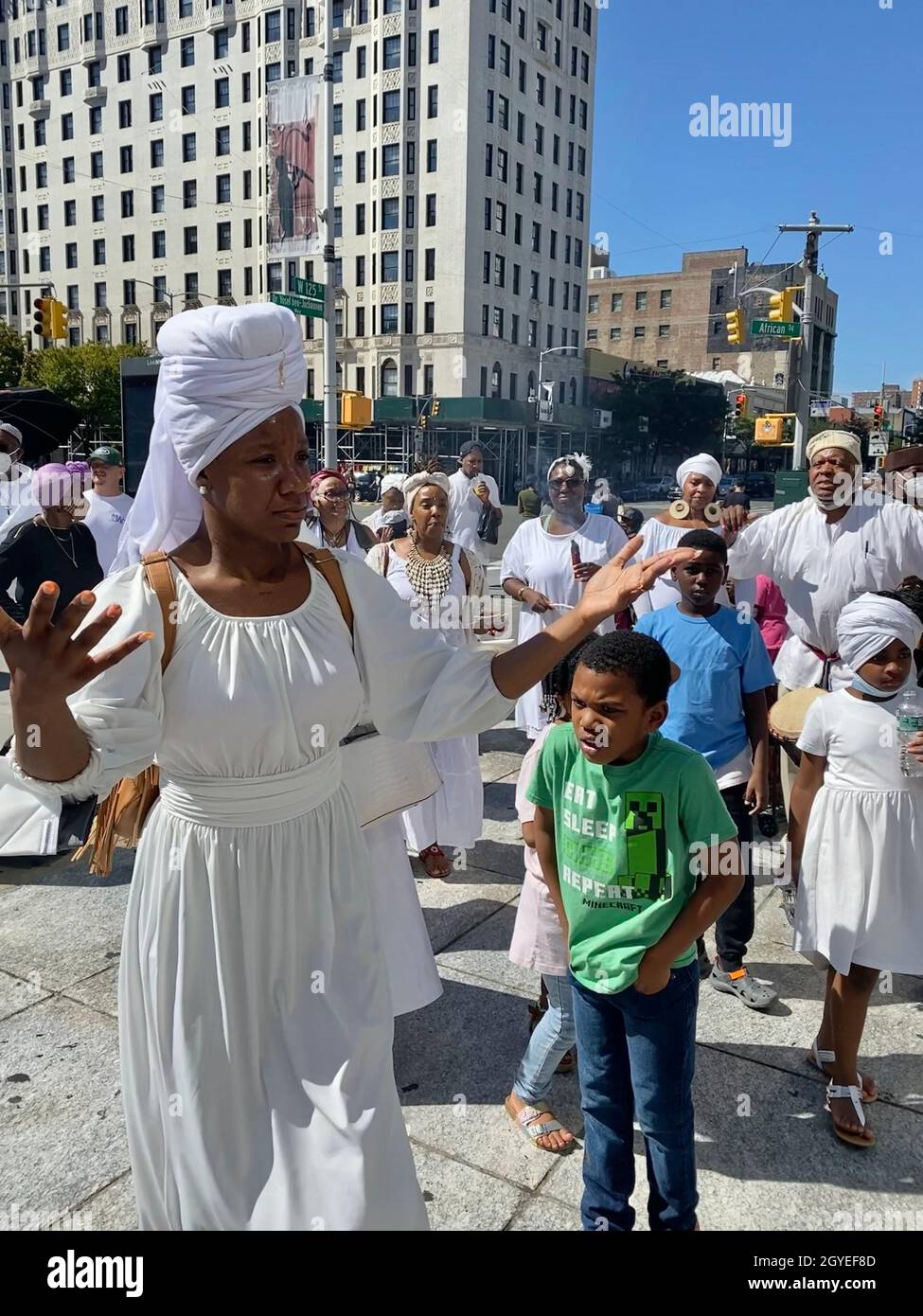 Group participates in an African Healing walk around Harlem during the ...