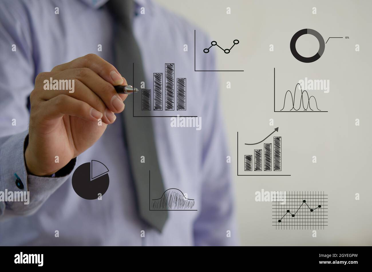 business chart and graph. Businessman touching virtual screen hologram. Investment business and ...