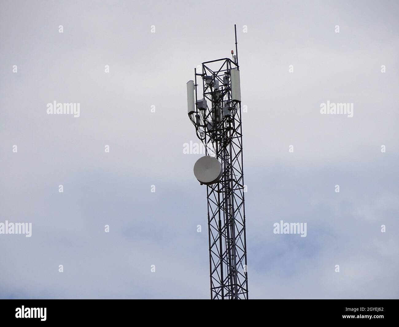 cloudy sky and telephone base station, telephone base station ...