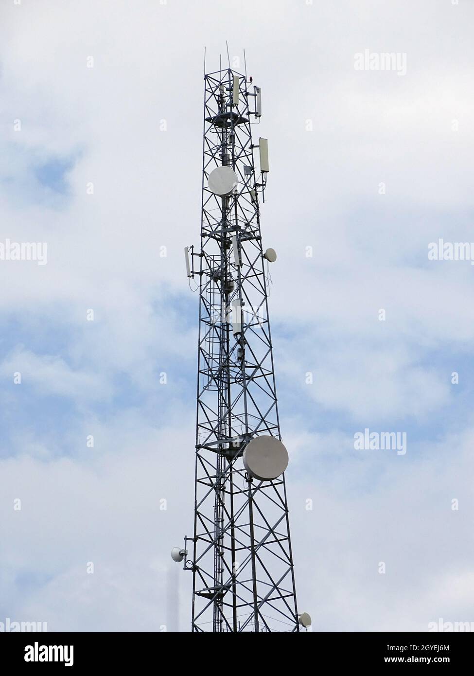 cloudy sky and telephone base station, telephone base station ...