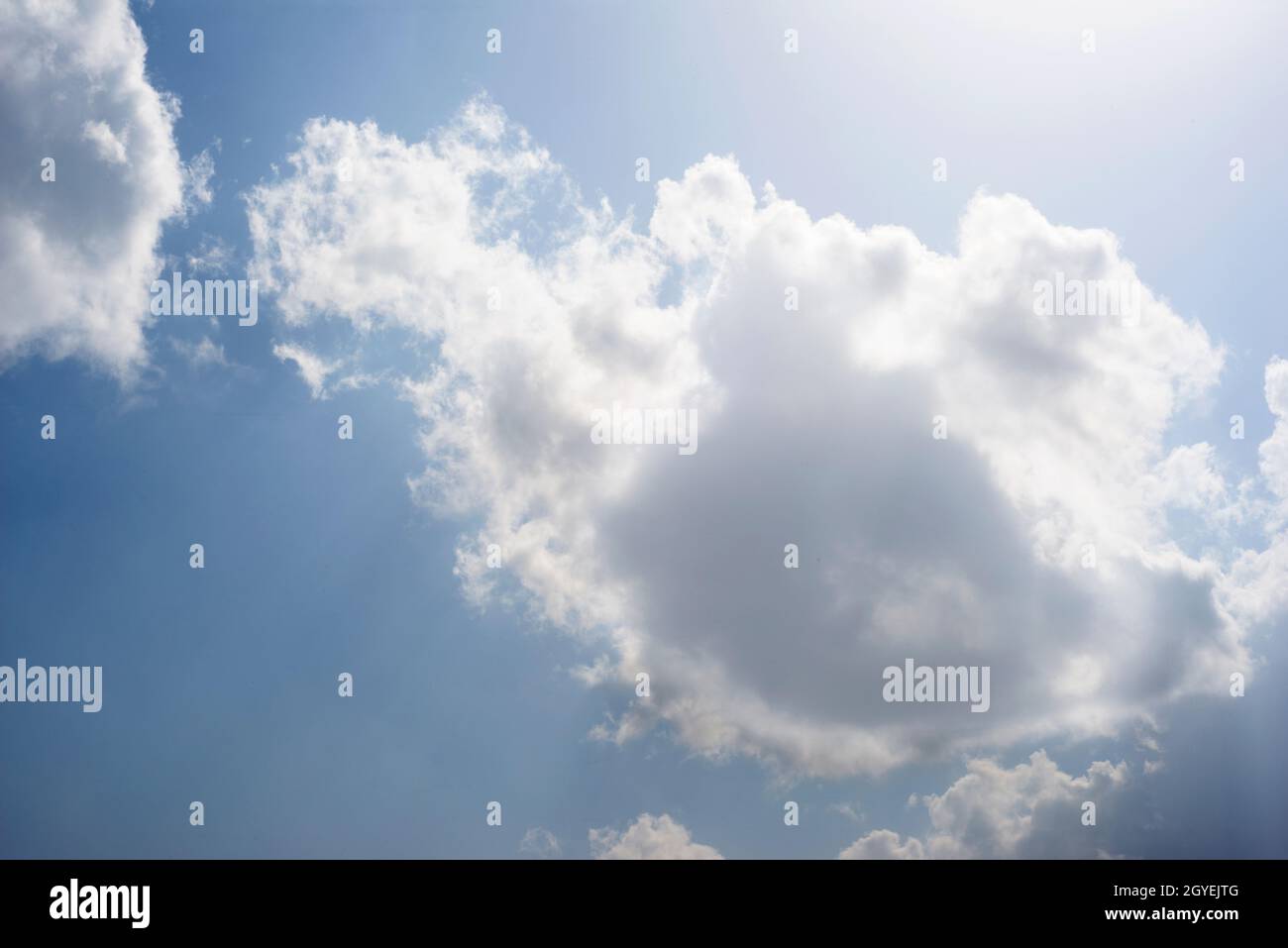 Scattered cloud clusters in a blue sky, blue sky background with white ...