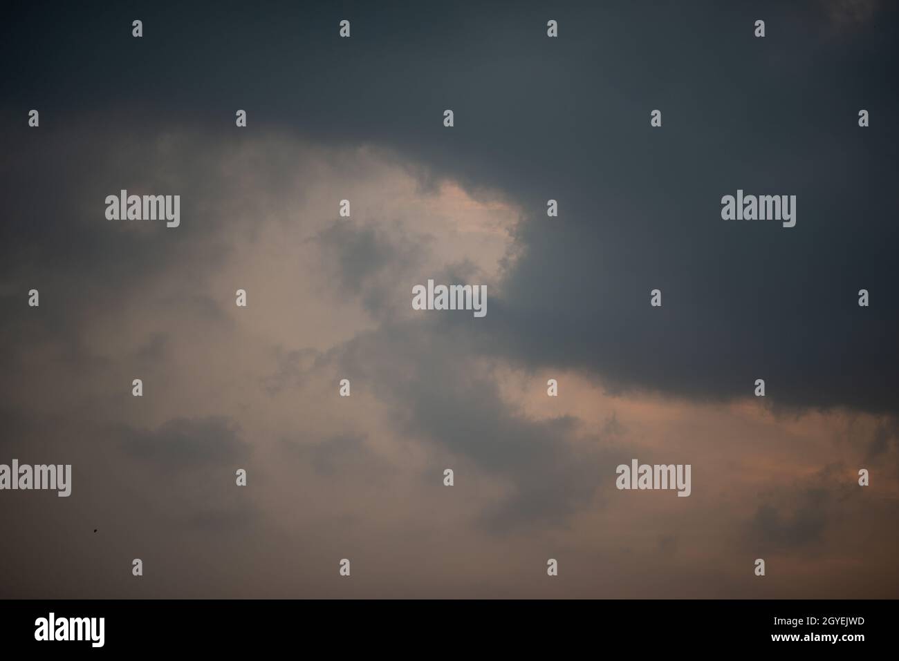 Dark black clouds in sky, Stormy rain clouds background Stock Photo - Alamy