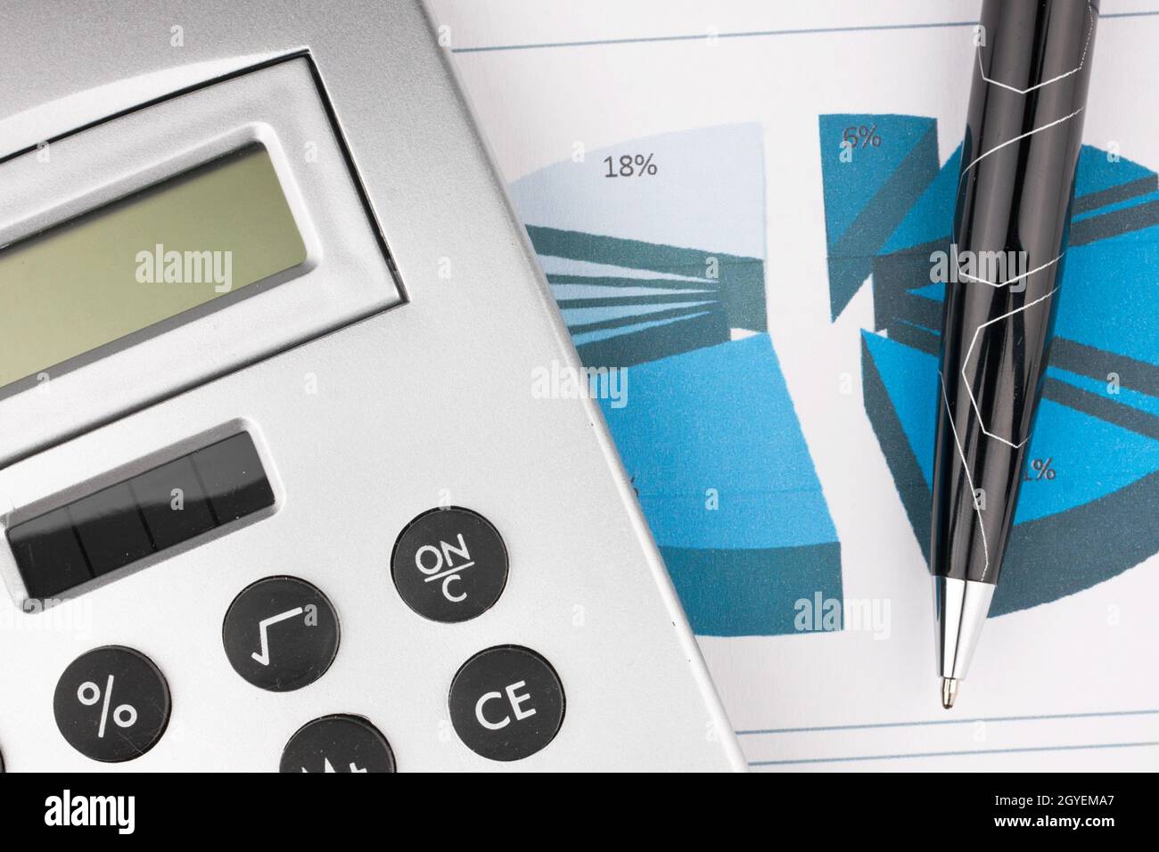 calculator, pen and paper with a diagram Stock Photo - Alamy