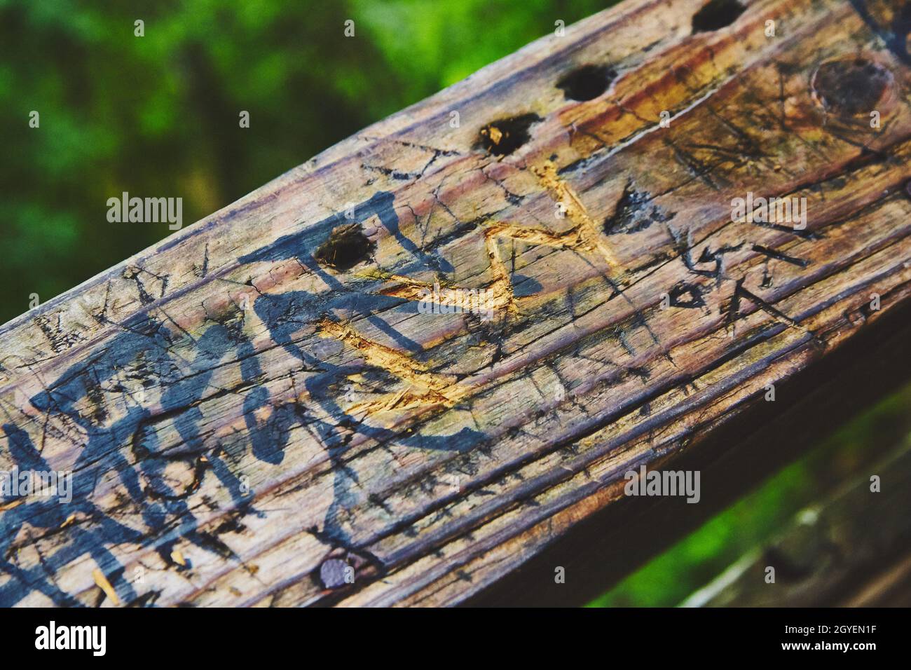 Texture of wood railing covered in carvings Stock Photo - Alamy