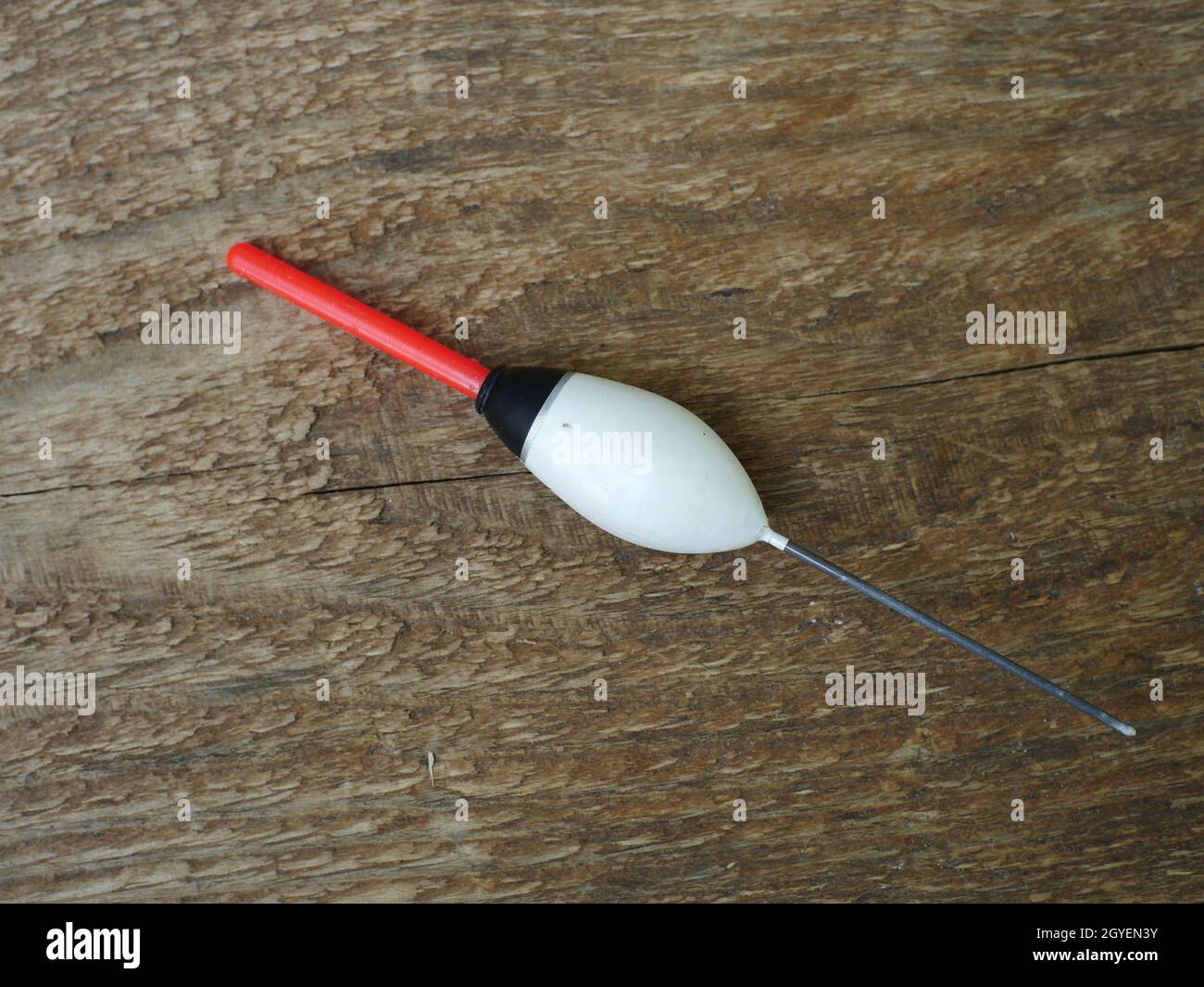 large white bobber with red antenna close-up, still life Stock Photo ...