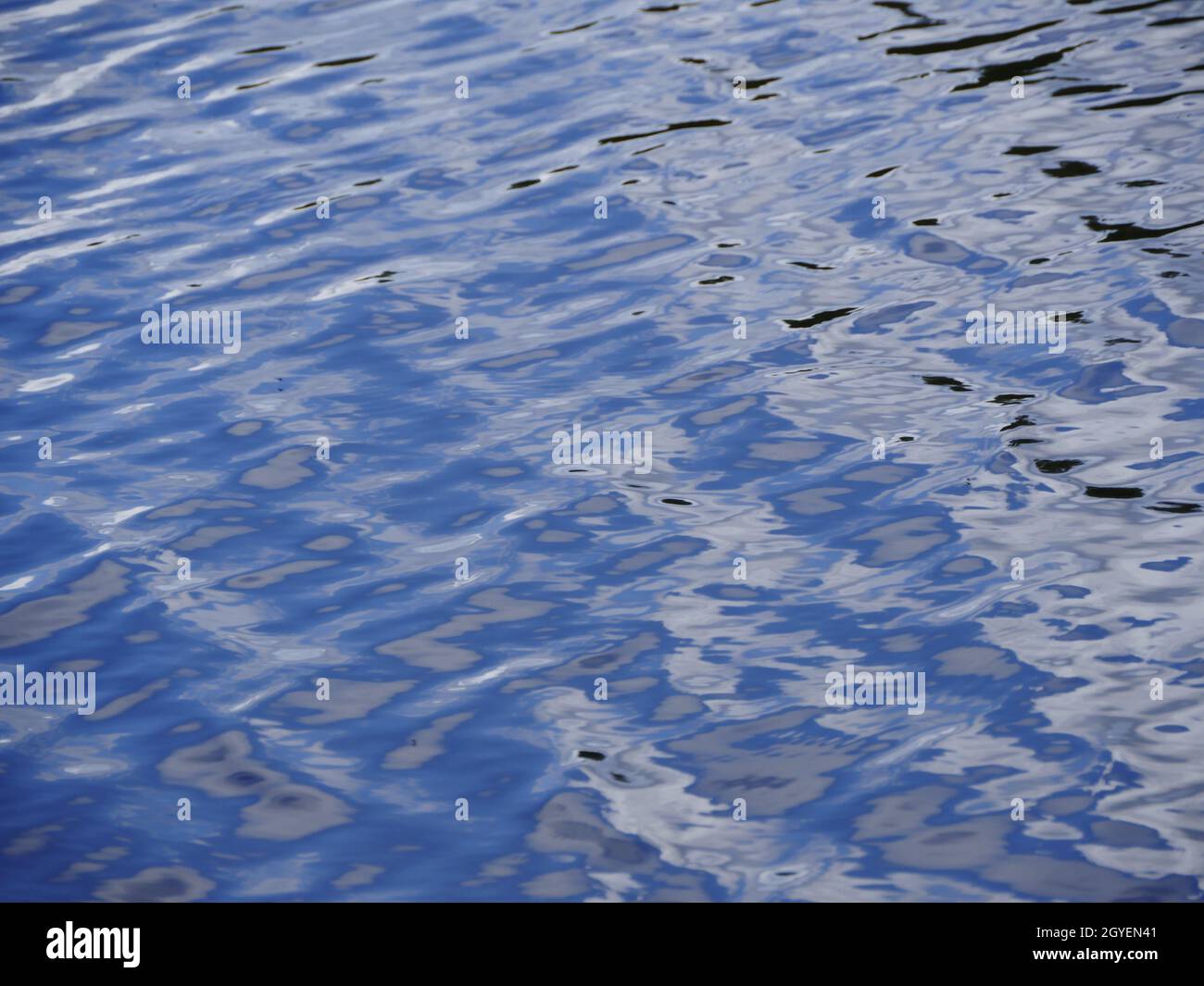 blue river water with highlights abstract background Stock Photo - Alamy
