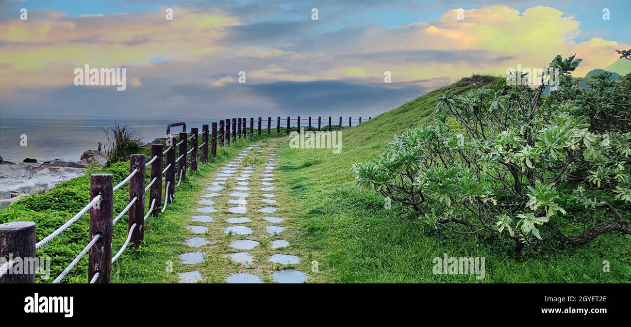 The path to nice sea beach in sunset sunshine with beautiful sky Stock ...