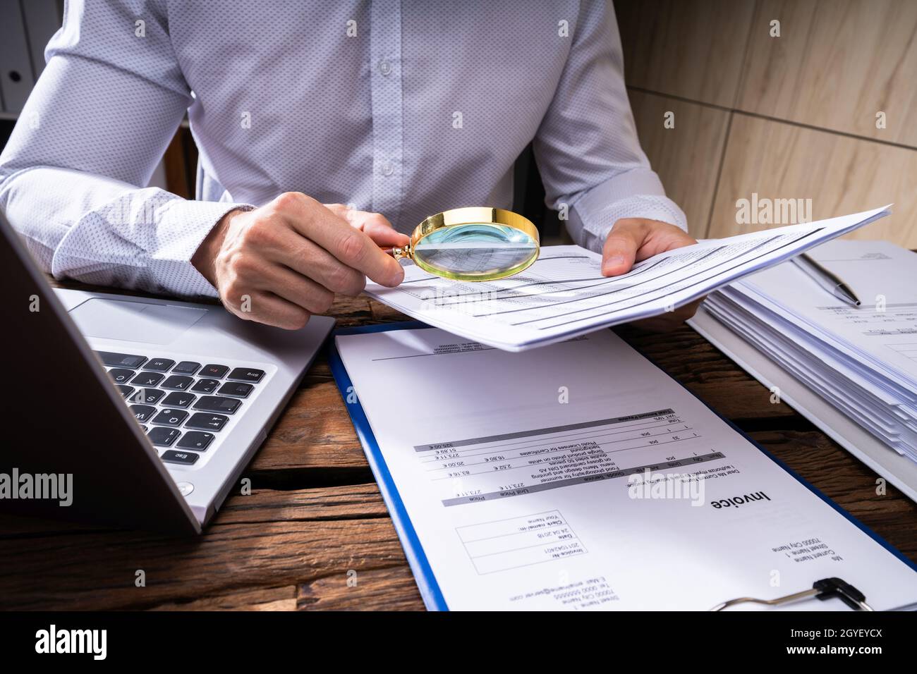 Investigating Corporate Tax Fraud. Commercial Auditor Using Magnifying ...