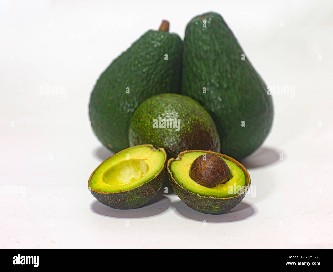 Close-up fresh avocado on white background. Fruit of health benefits ...