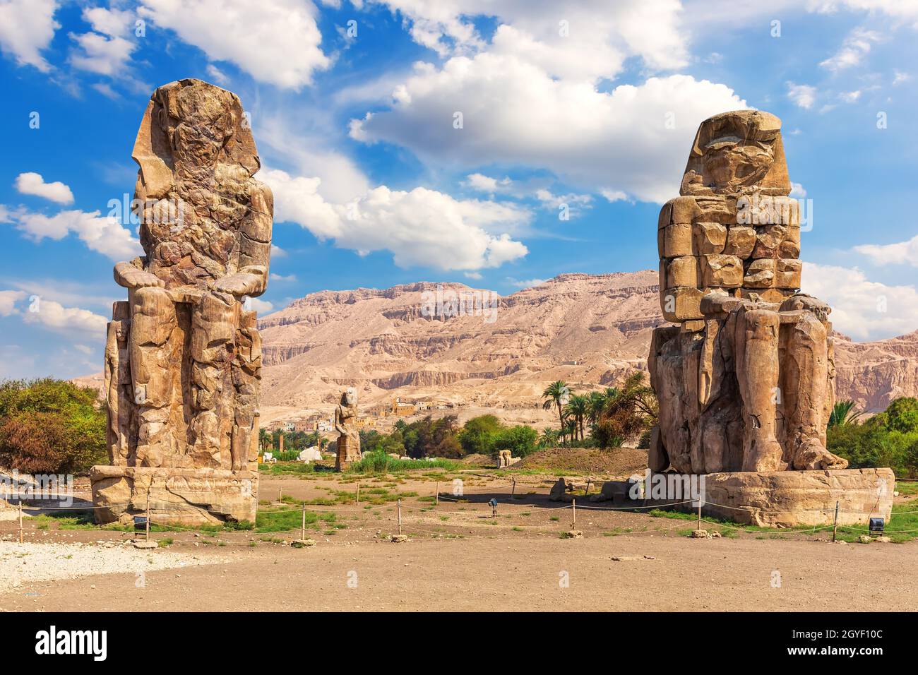 The Colossi of Memnon in the Theban Necropolis, statues of the Pharaoh ...