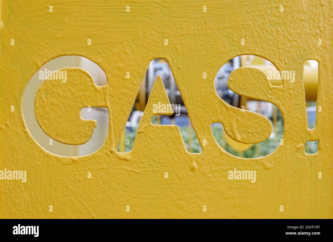 Warning on a metal cage with gas equipment for the public. Attention ...