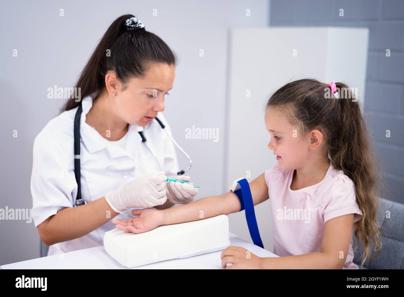 Child Doctor Medical Blood Test And Check Stock Photo - Alamy