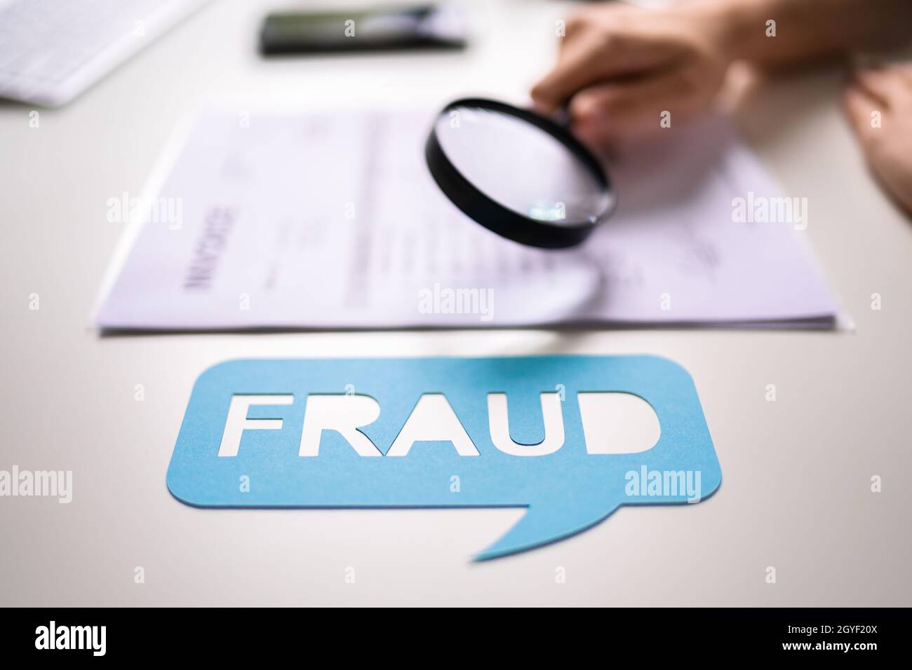 Auditor Doing Tax Fraud Investigation Using Magnifying Glass Stock ...