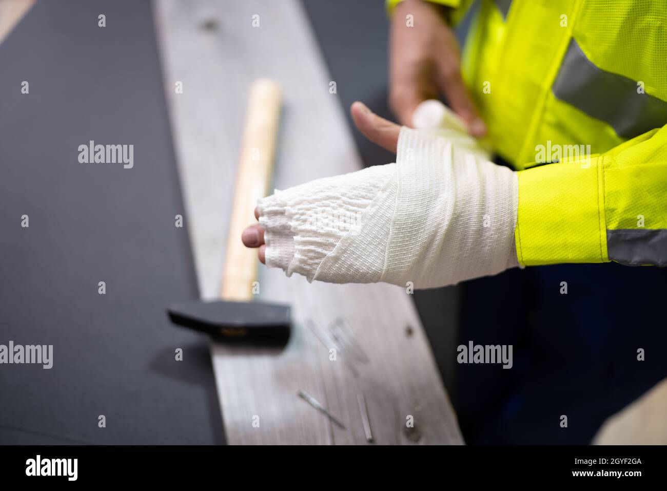 Man bandage hammer hi-res stock photography and images - Alamy