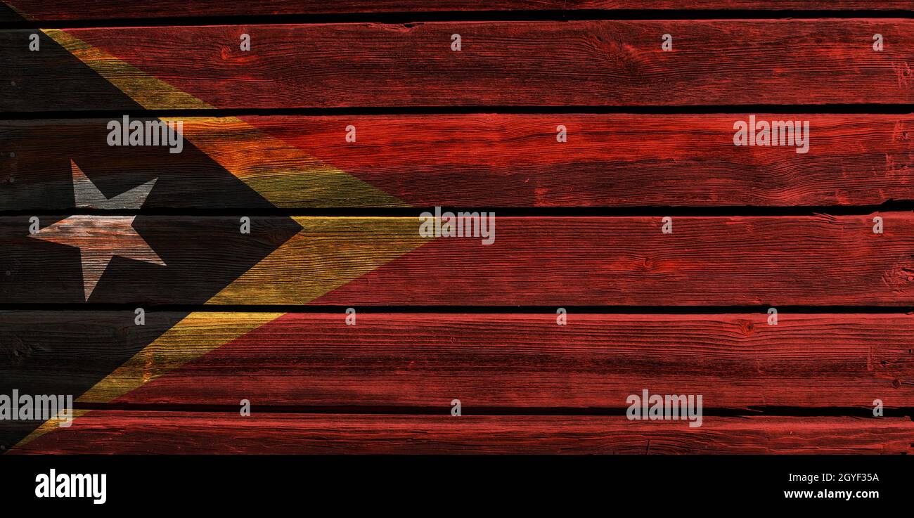 3D Flag of East Timor on a old wood wall background Stock Photo - Alamy