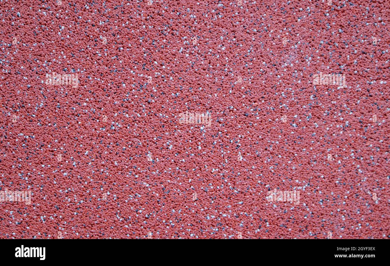 Colorful decorative mosaic plaster in burgundy or red. Wall texture ...