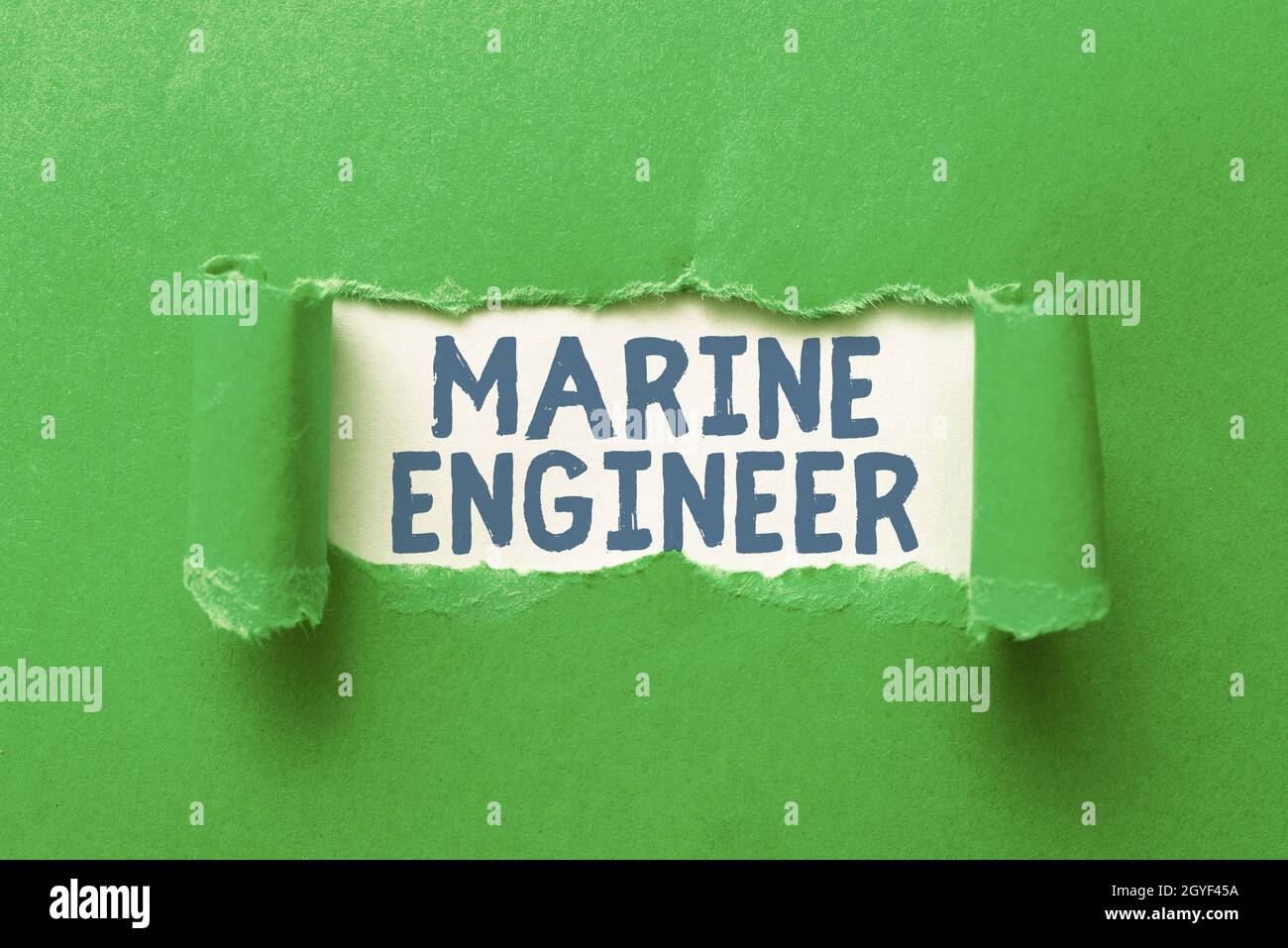 Sign displaying Marine Engineer, Business overview incharge with ...