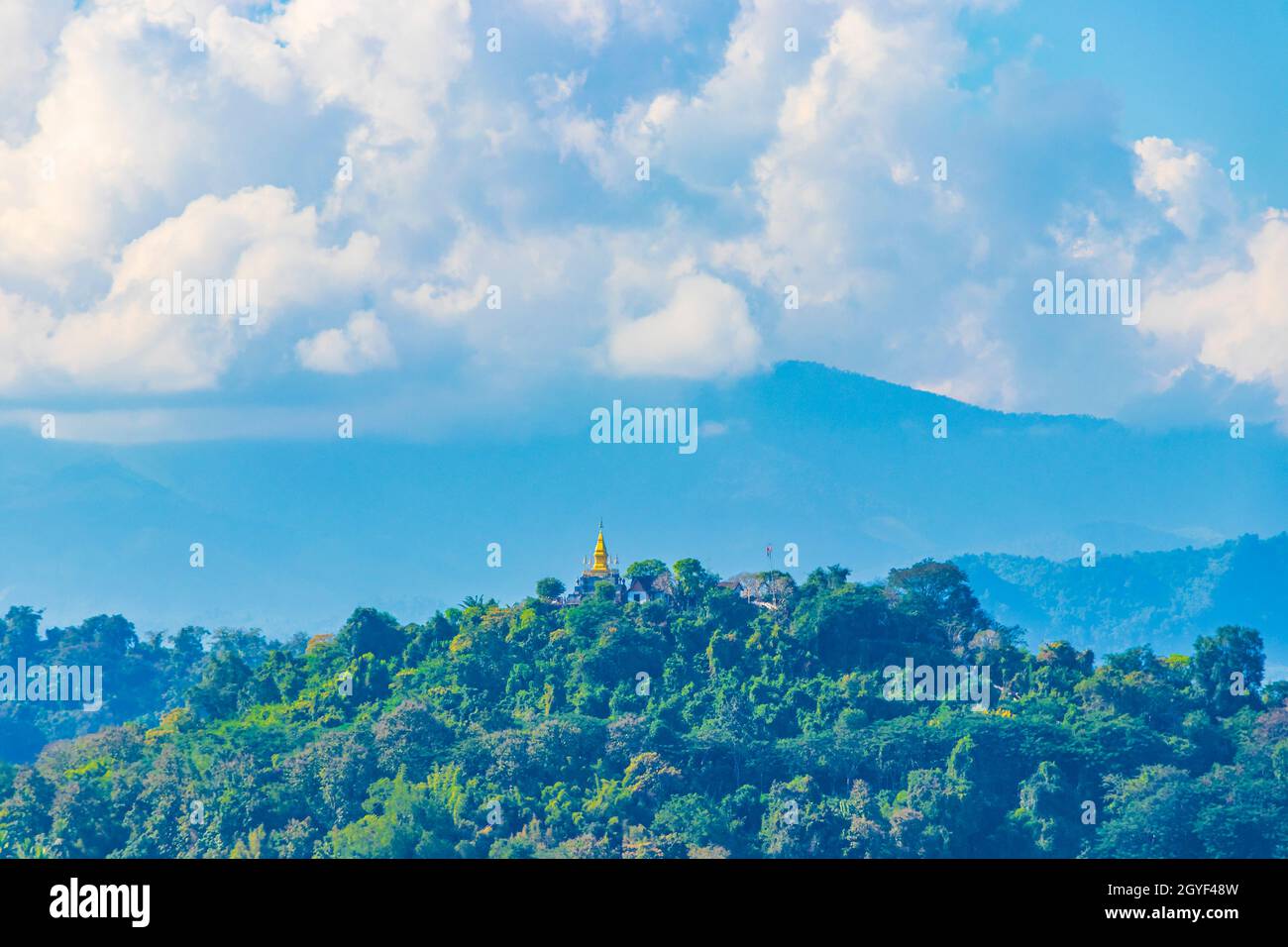 Panorama of the mountain Phousi Hill landscape and Wat Chom Si stupa in ...
