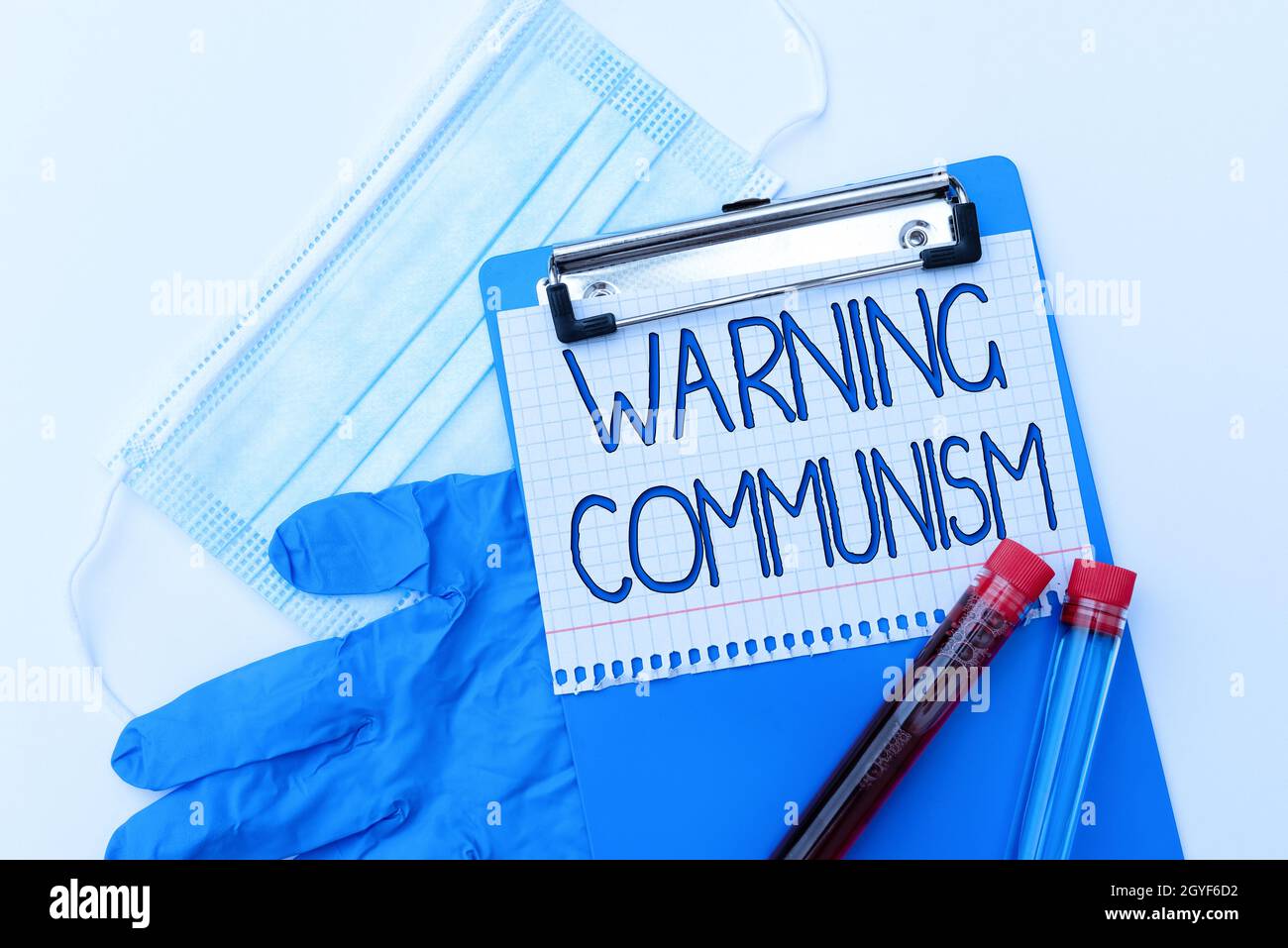 Text sign showing Warning Communism, Word Written on economic system ...
