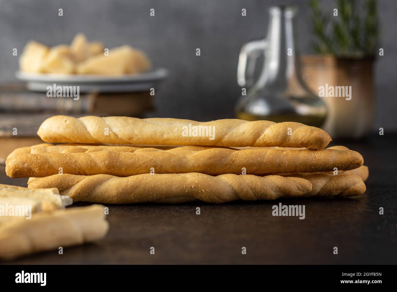 Grissini sticks. Traditional italian bread sticks on black table Stock ...