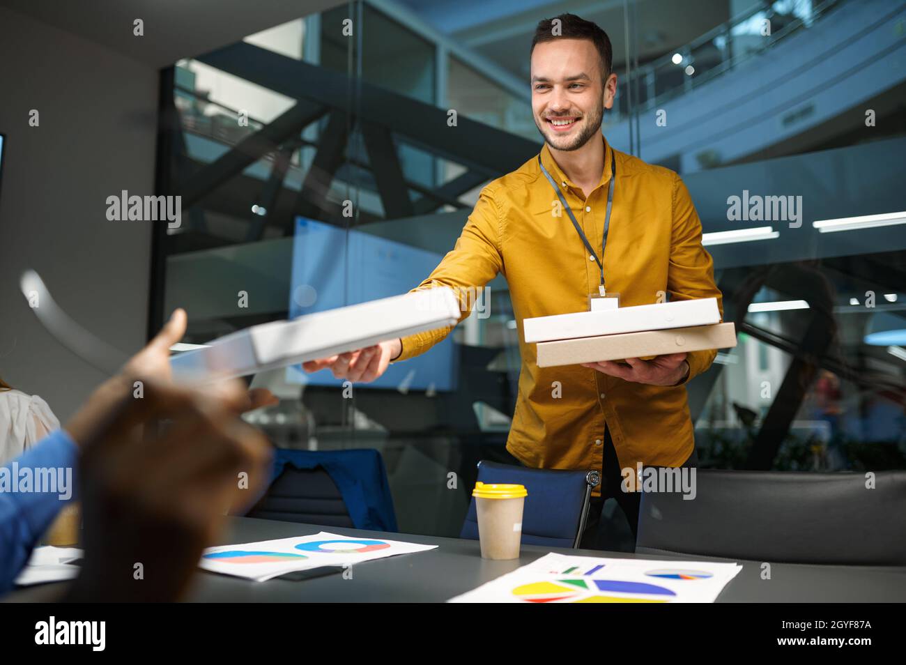 People eats pizza, business lunch in IT office. Professional teamwork ...