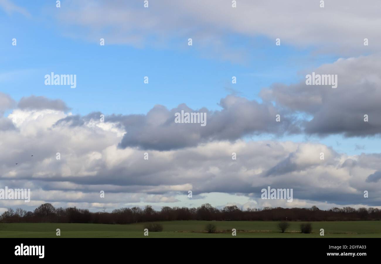 Beautiful clouds in a blue sky over a northern european landscape Stock ...