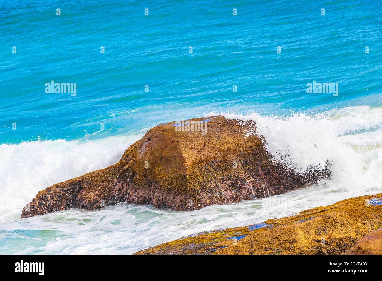 Strong wave hits huge rock at amazing Praia de Lopes Mendes beach on ...