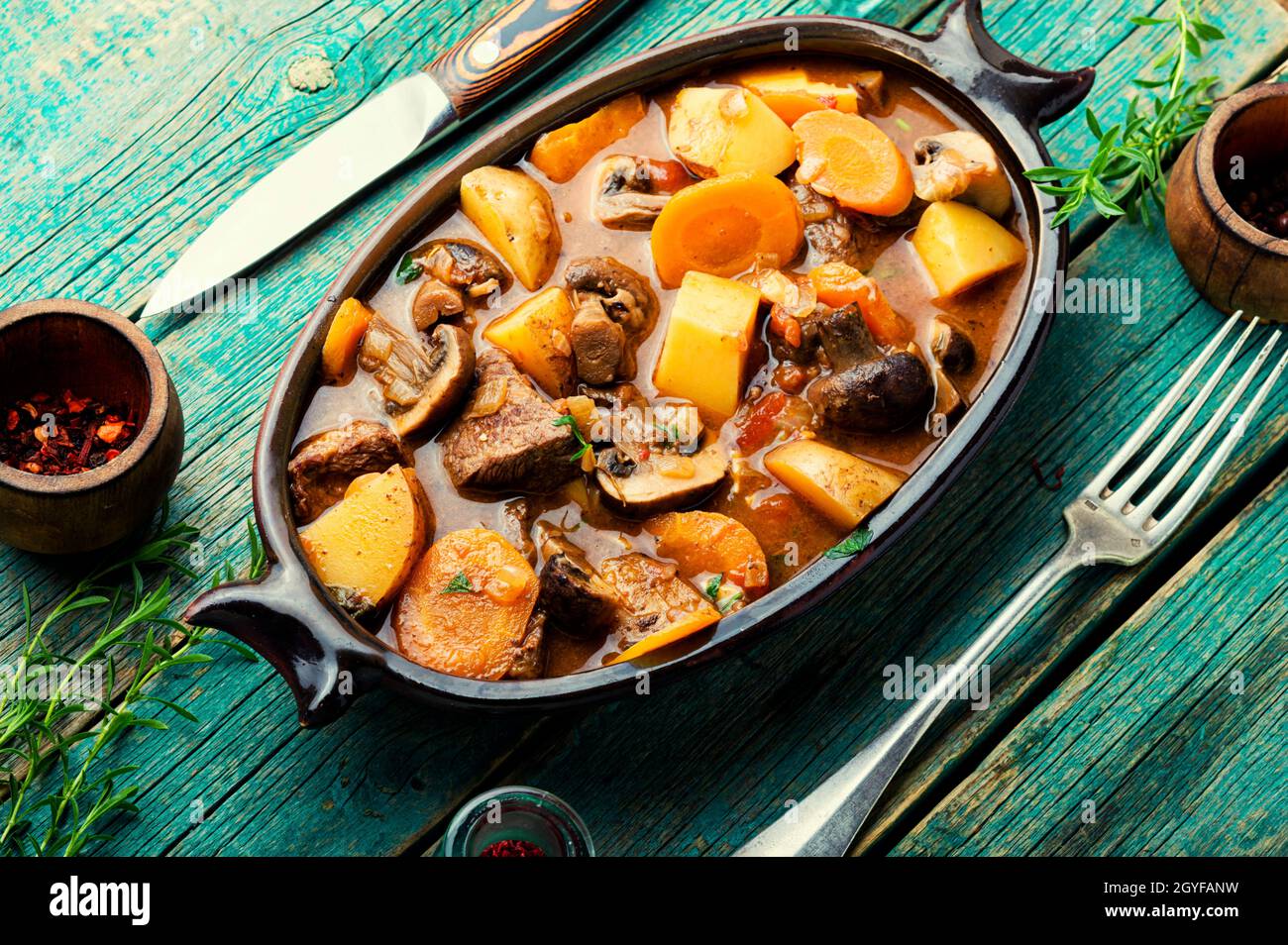 Delicious ragout with beef and mushrooms. Meat sauce with veal Stock Photo - Alamy