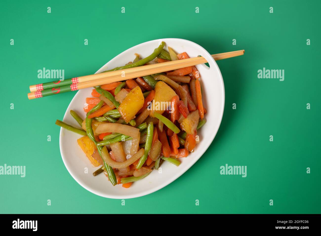 Vegetable stir fry in a plate. Healthy eating Stock Photo - Alamy