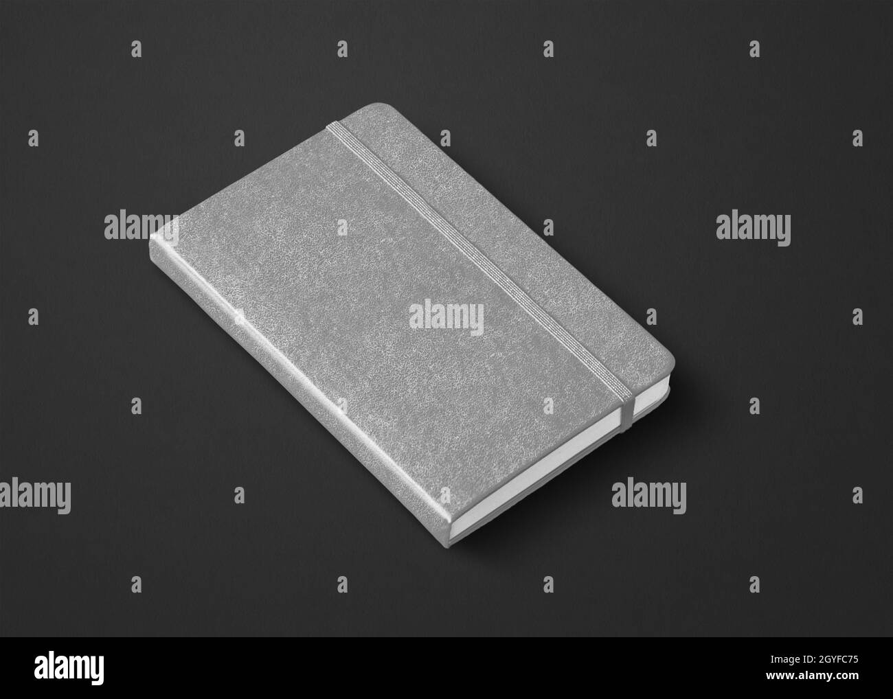 Grey closed notebook mockup isolated on black Stock Photo - Alamy