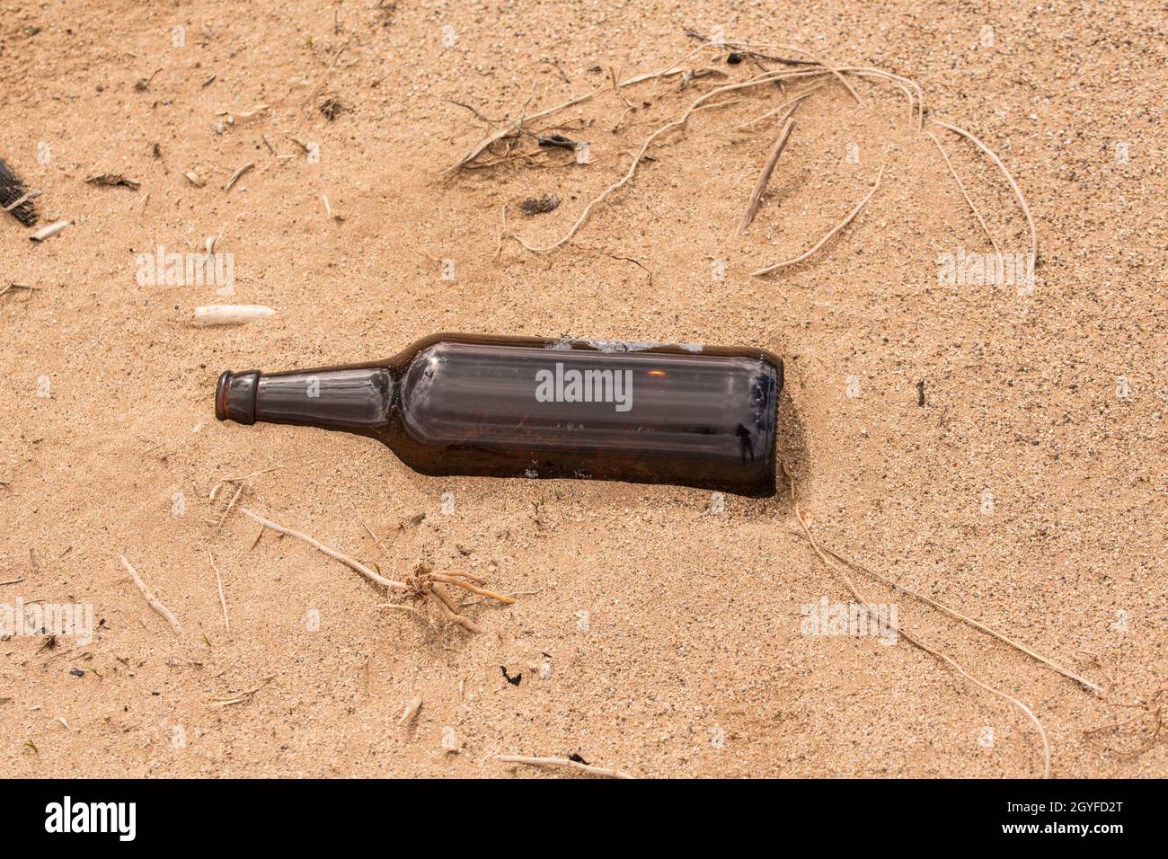 Empty bottle alcohol on beach hi-res stock photography and images - Alamy