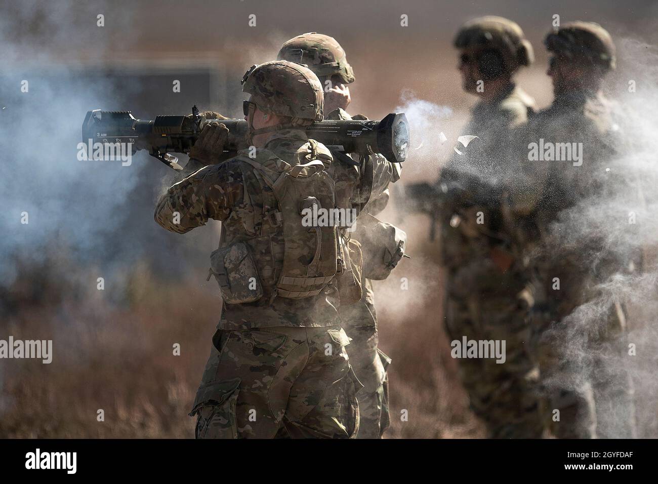 Idaho Army National Guard Pfc. Hunter Fischer (left) fires the AT-4 ...