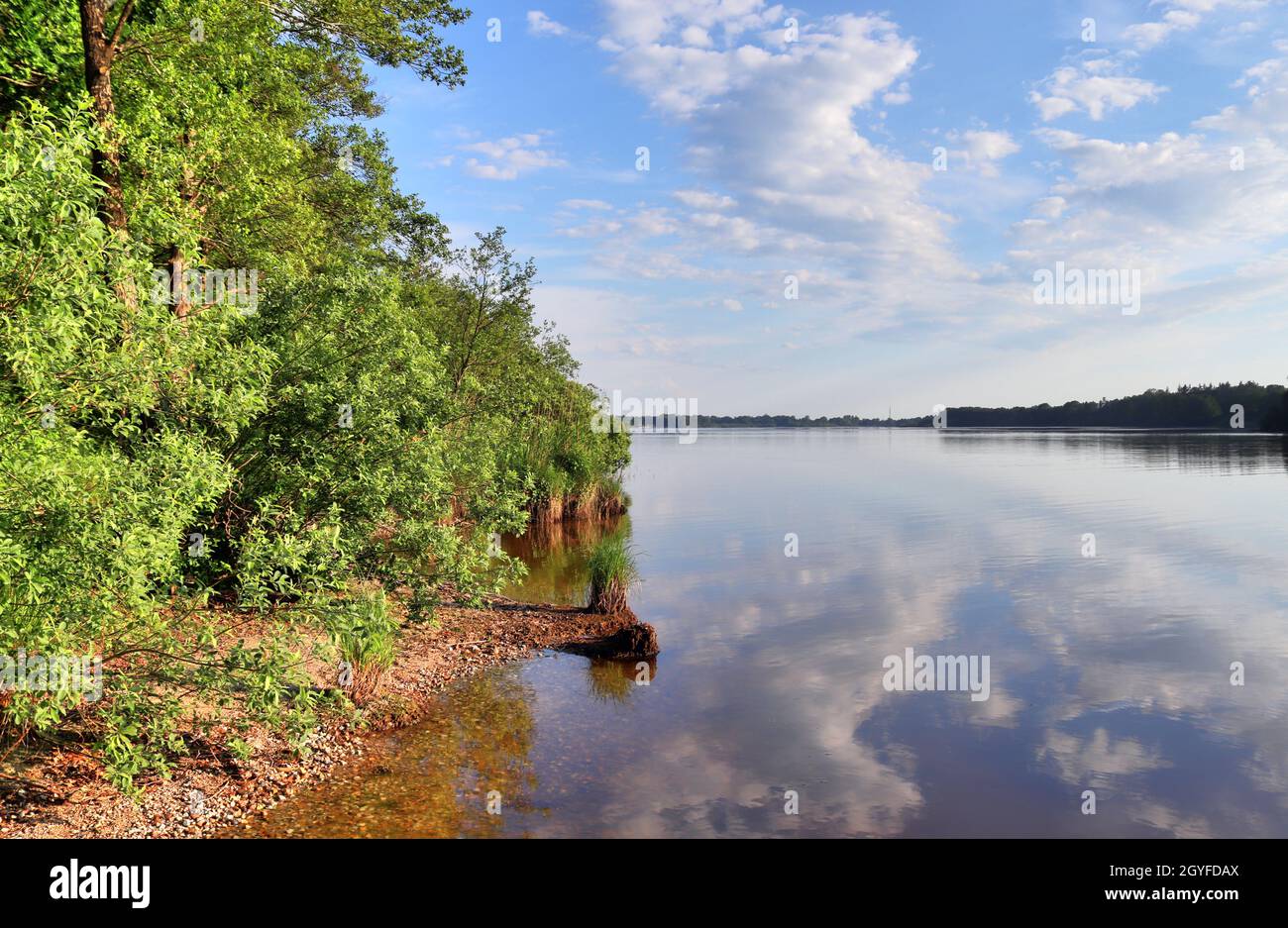 Beautiful landscape at a lake with a reflective water surface Stock ...