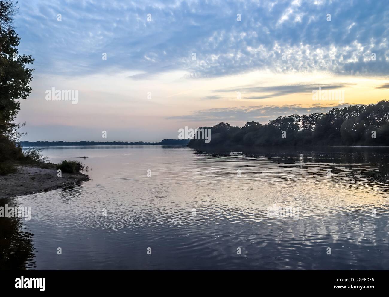 Beautiful landscape at a lake with a reflective water surface Stock ...