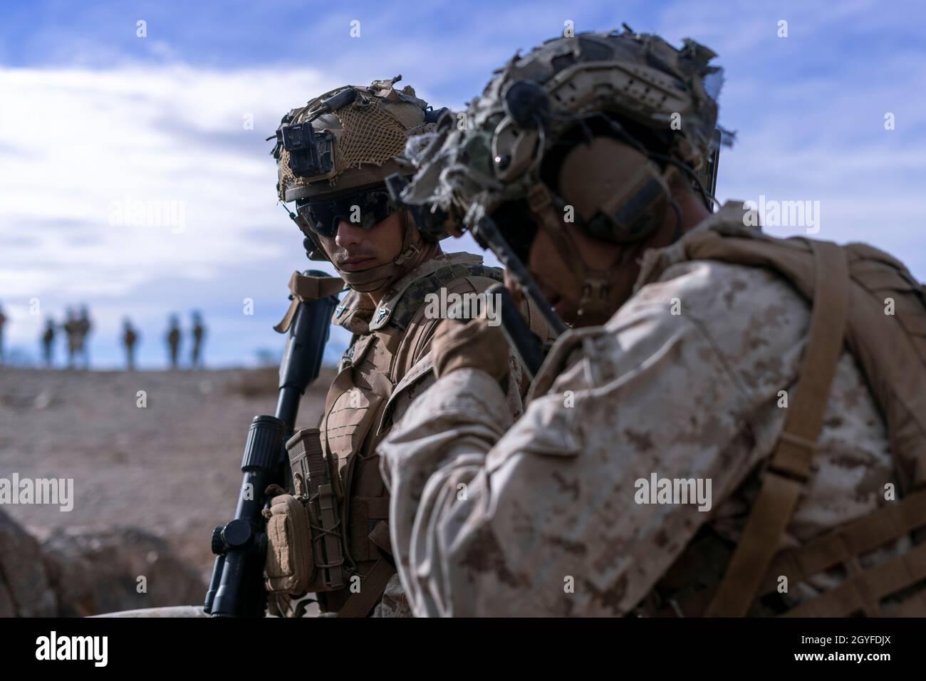 U.S. Marines with 1st Battalion, 3d Marines, communicate while ...