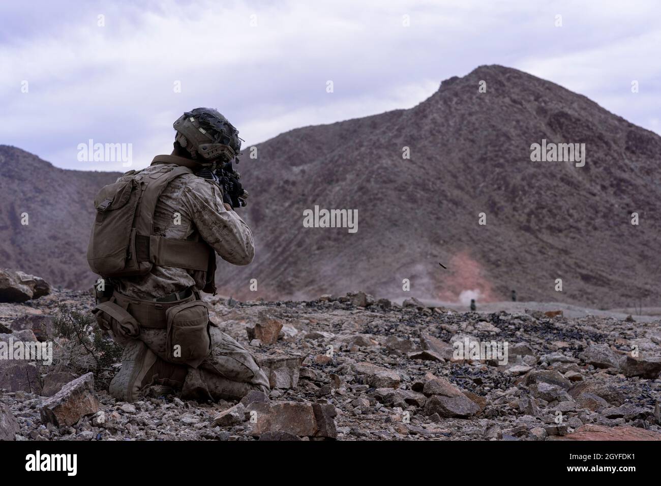 A U.S. Marine with 1st Battalion, 3d Marines, engages targets on Range ...