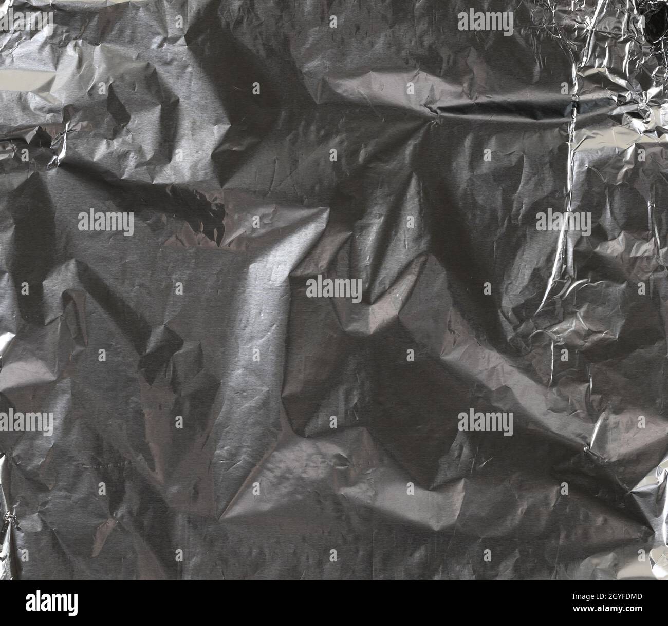 crumpled gray foil sheet for food packaging, full frame Stock Photo - Alamy