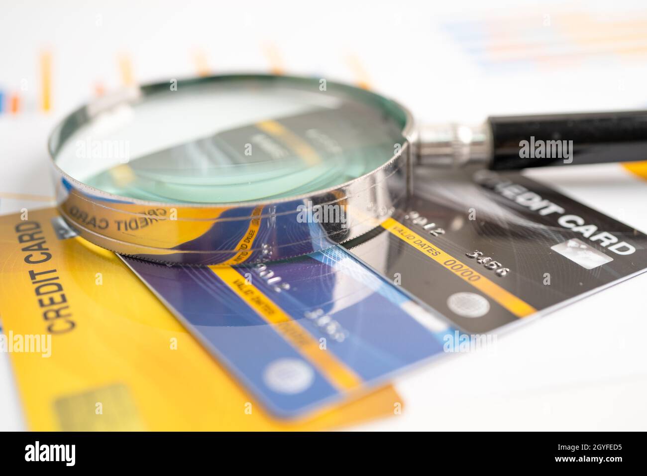 Credit card on chart and graph paper. Finance development, Banking ...