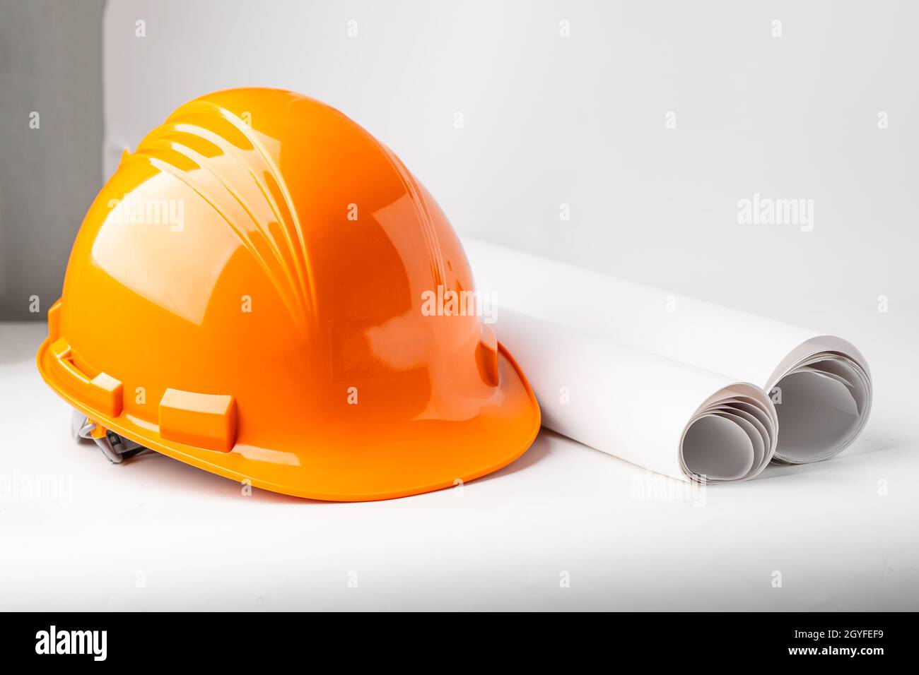 Orange construction helmet isolated on white background, engineer ...