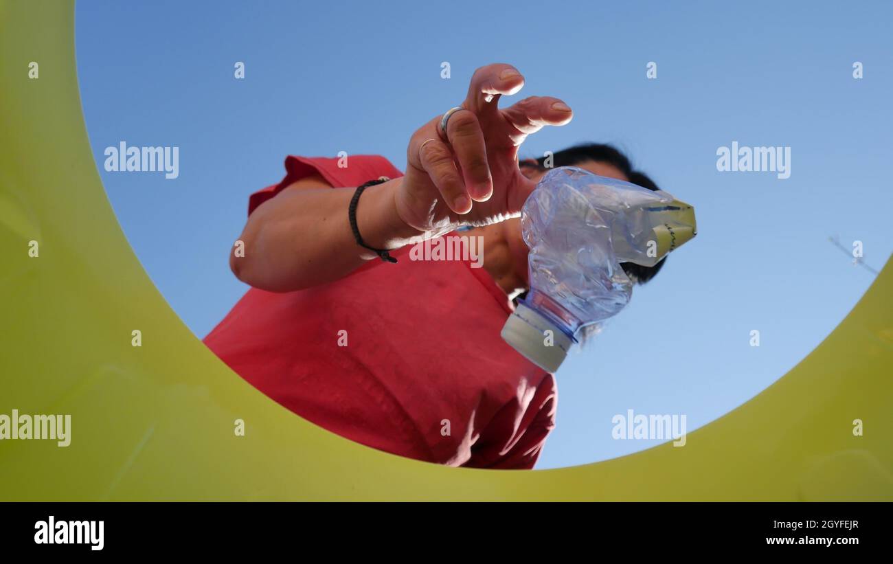 Woman seen recycling plastic hi-res stock photography and images - Alamy