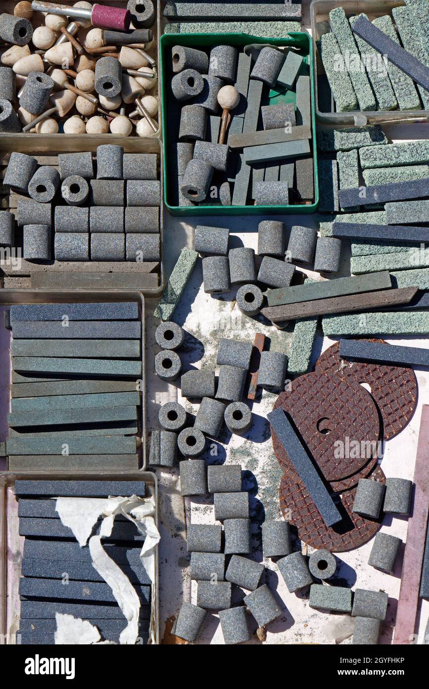 Industrial sandpaper grit extensions inside metal box Stock Photo - Alamy