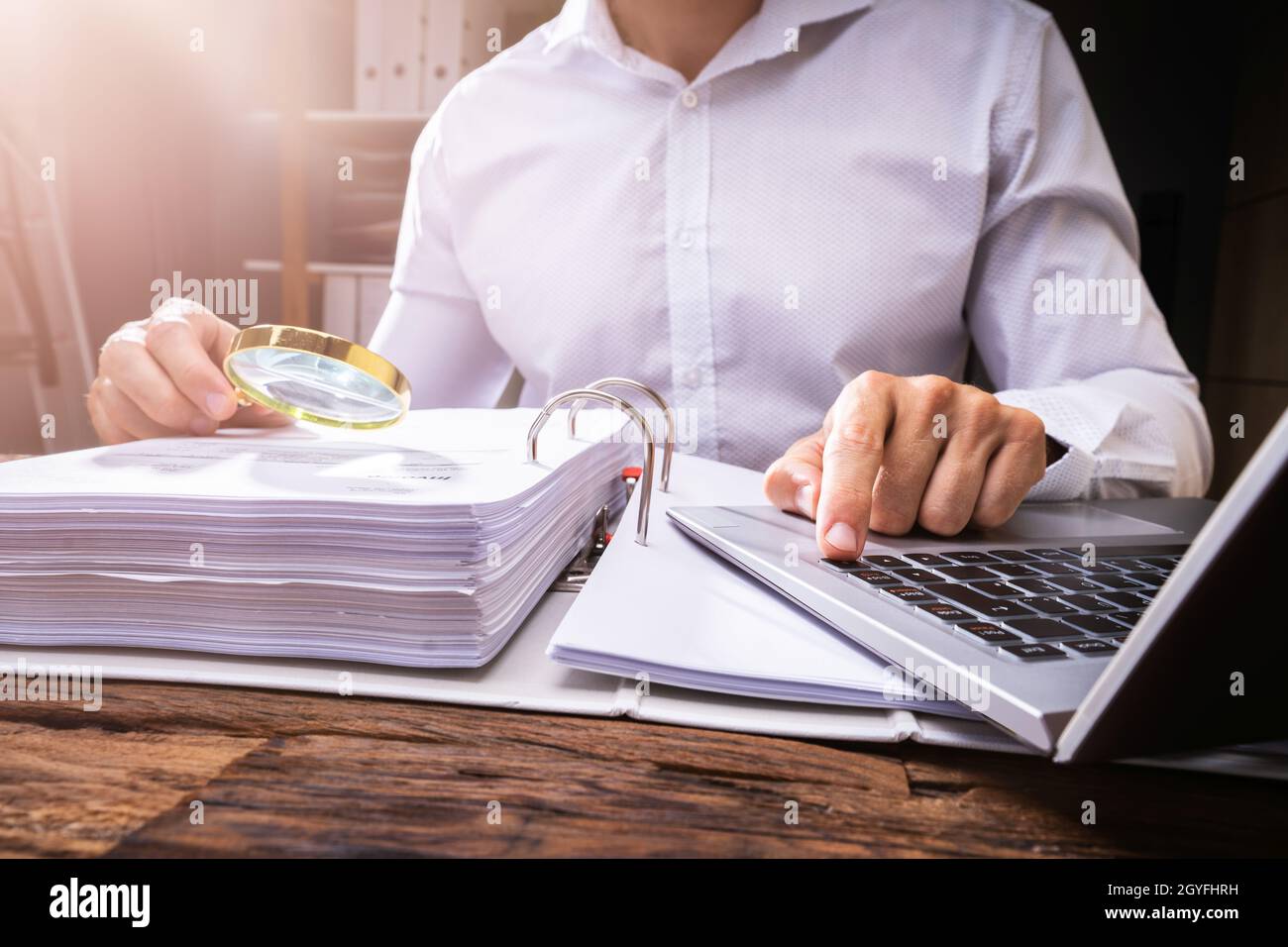 Investigating Corporate Tax Fraud. Commercial Auditor Using Magnifying ...