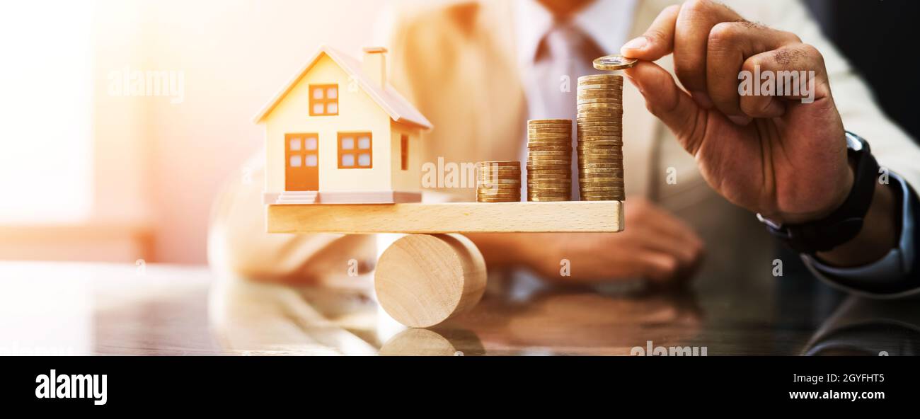 House Model Balance Equilibrium Concept. Real Estate Money Stock Photo ...