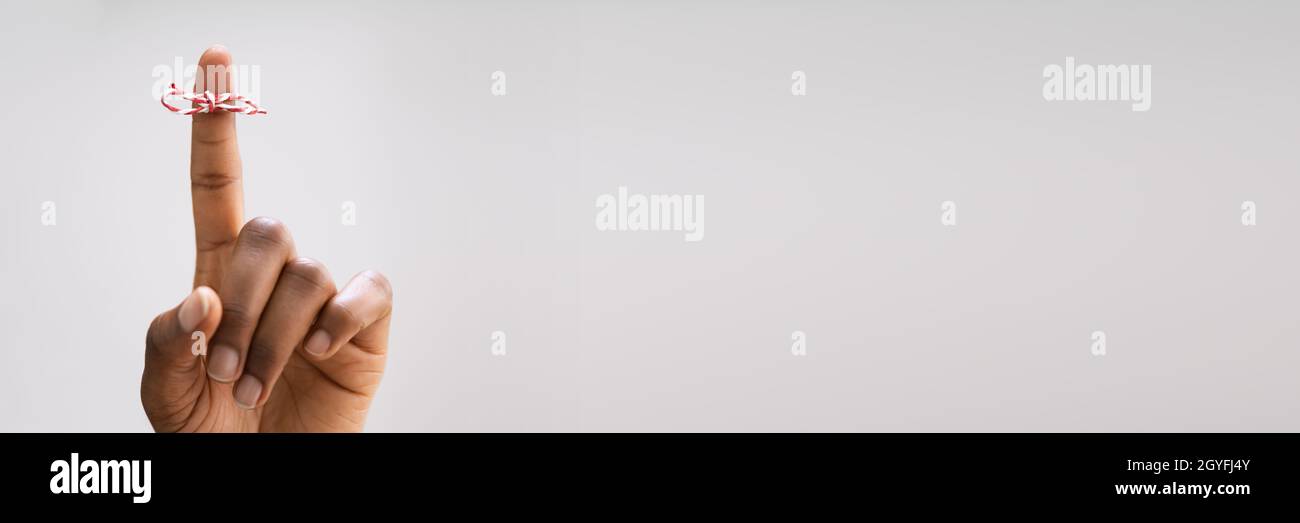 Remind One Important Thing On Finger. Remember Ribbon Stock Photo - Alamy